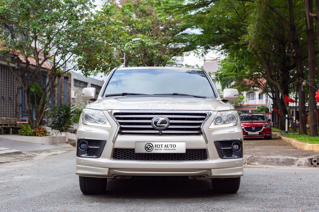 Lexus LX570 2014 màu vàng cát - 128488174